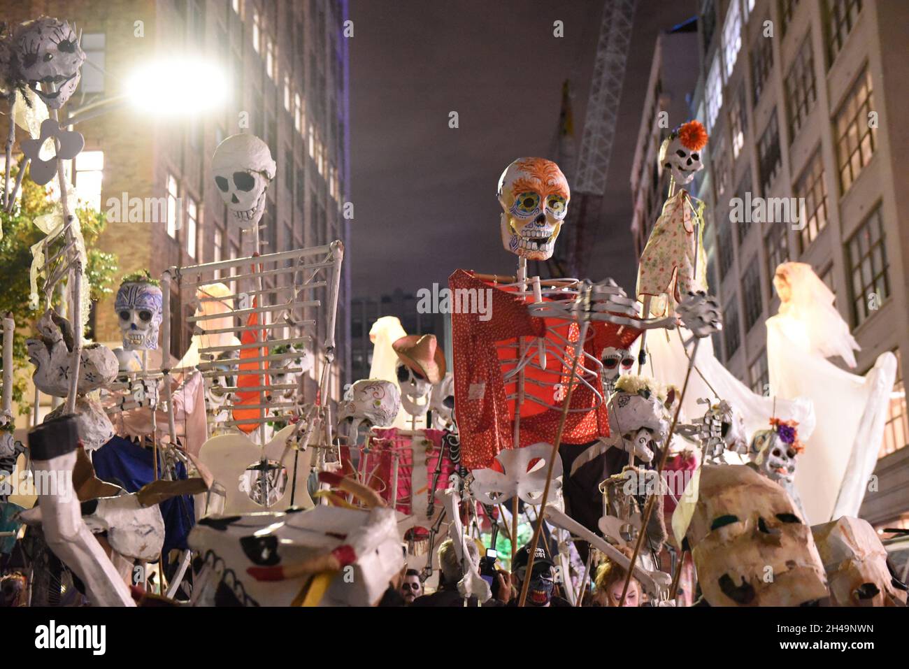 New York, New York, USA. 31st Oct, 2021. Performers carry giant puppets ...