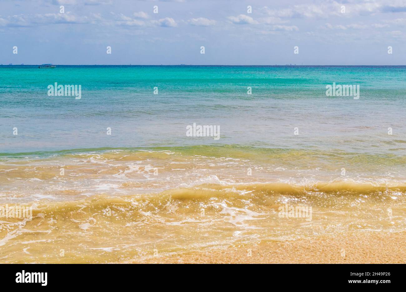 Tropical mexican beach with strong waves and clear turquoise blue water ...