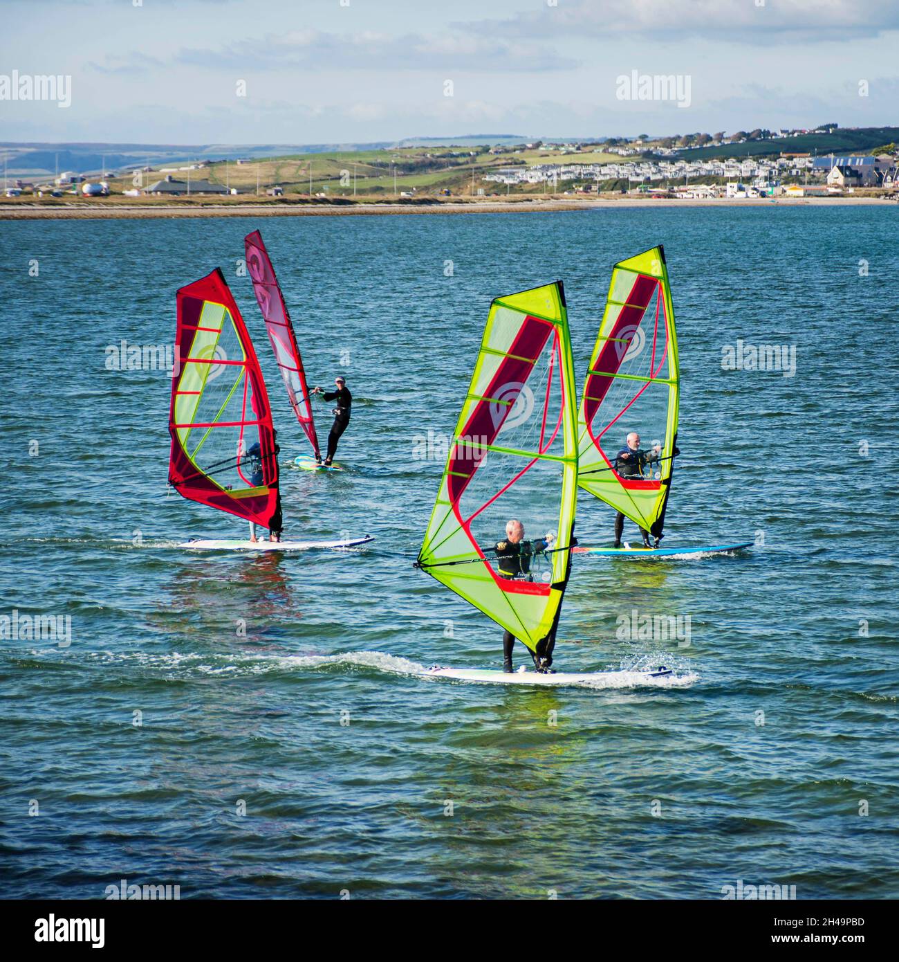 Windsurfing at Portland Harbour, Weymouth, Dorset, England, UK Stock ...