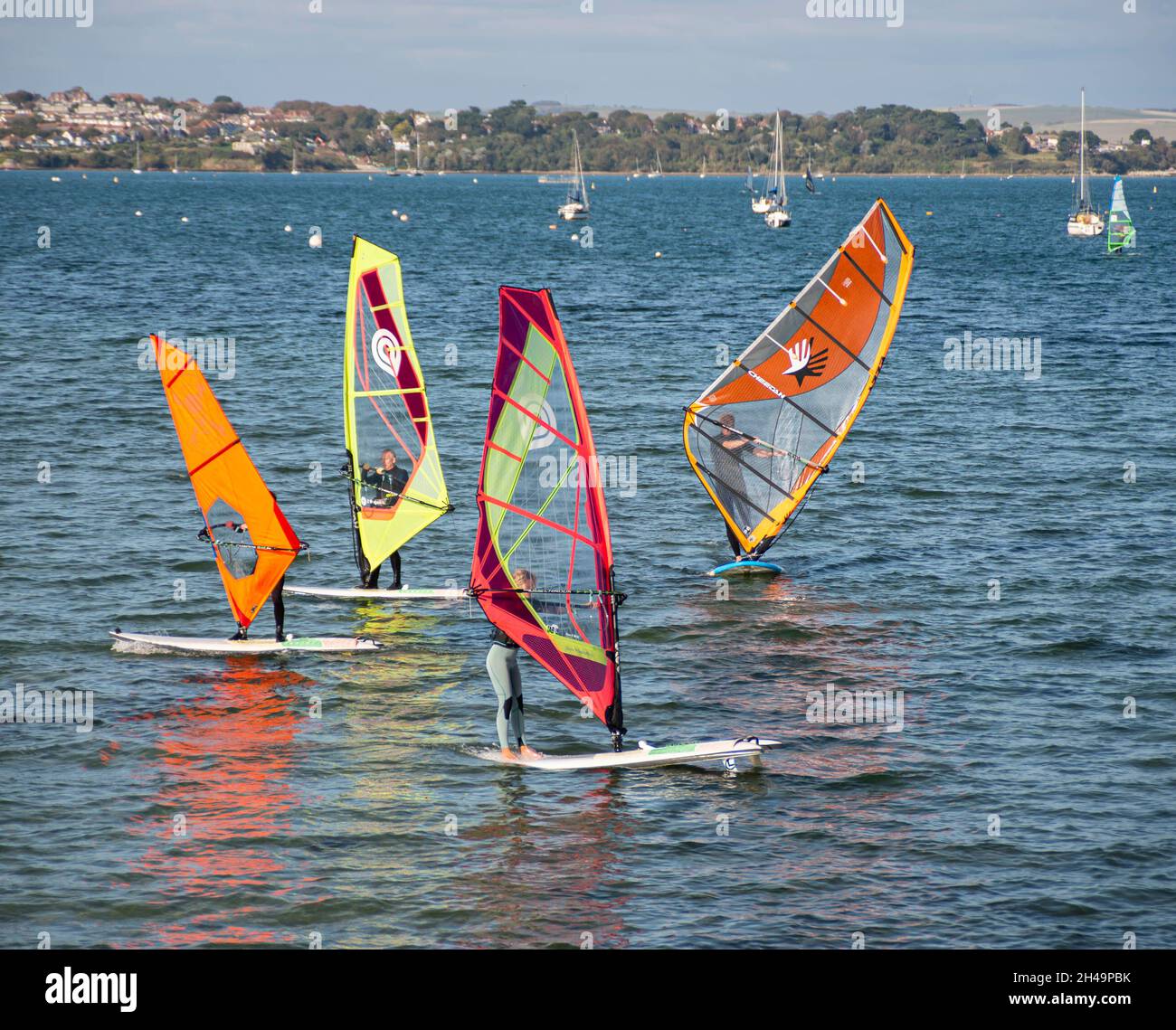 Windsurfing at Portland Harbour, Weymouth, Dorset, England, UK Stock ...