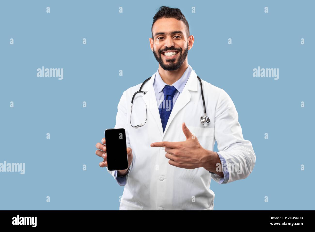Arabic Therapist Man Showing Phone With Blank Screen Advertising ...