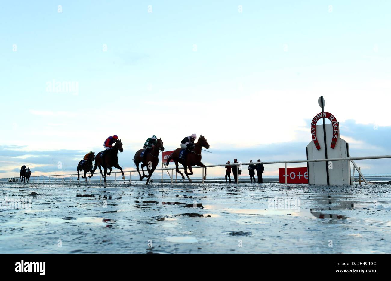 Limit Long ridden by jockey Finny Maguire (right, blue and pink silks ...