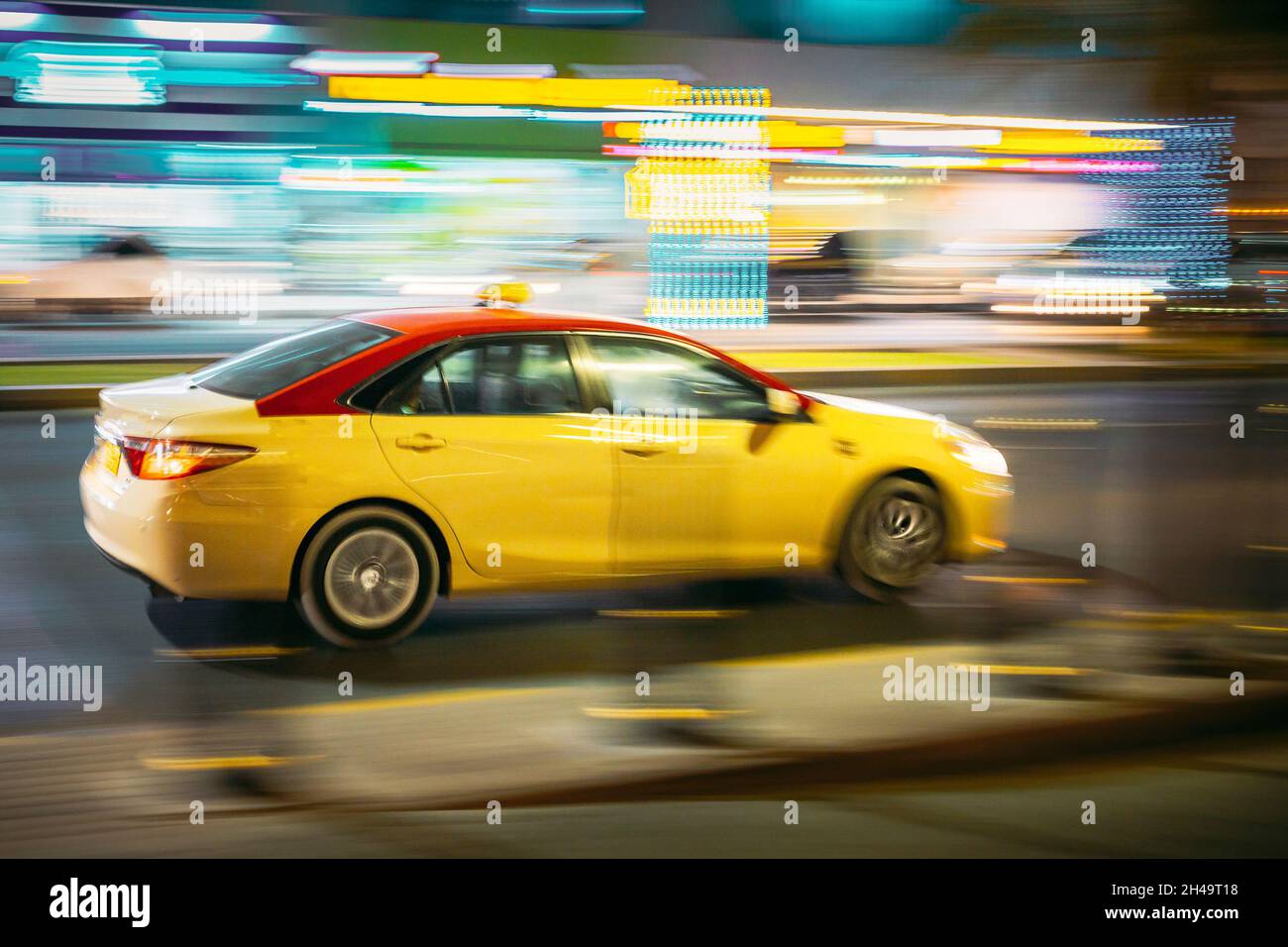 Speeding Taxi Car Fast Driving In City Street. Motion Blur Background ...
