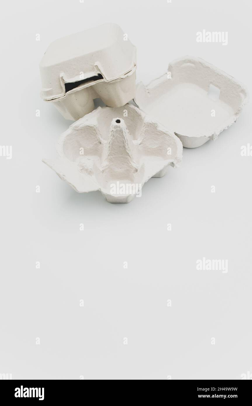 empty recycled cardboard egg box on a white background Stock Photo - Alamy