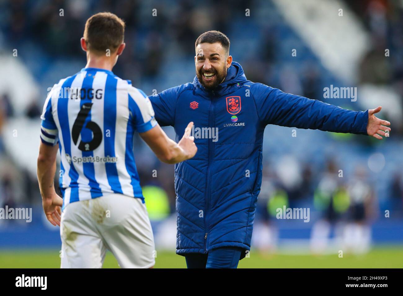 Huddersfield Town's Jonathan Hogg celebrates with a member of the ...