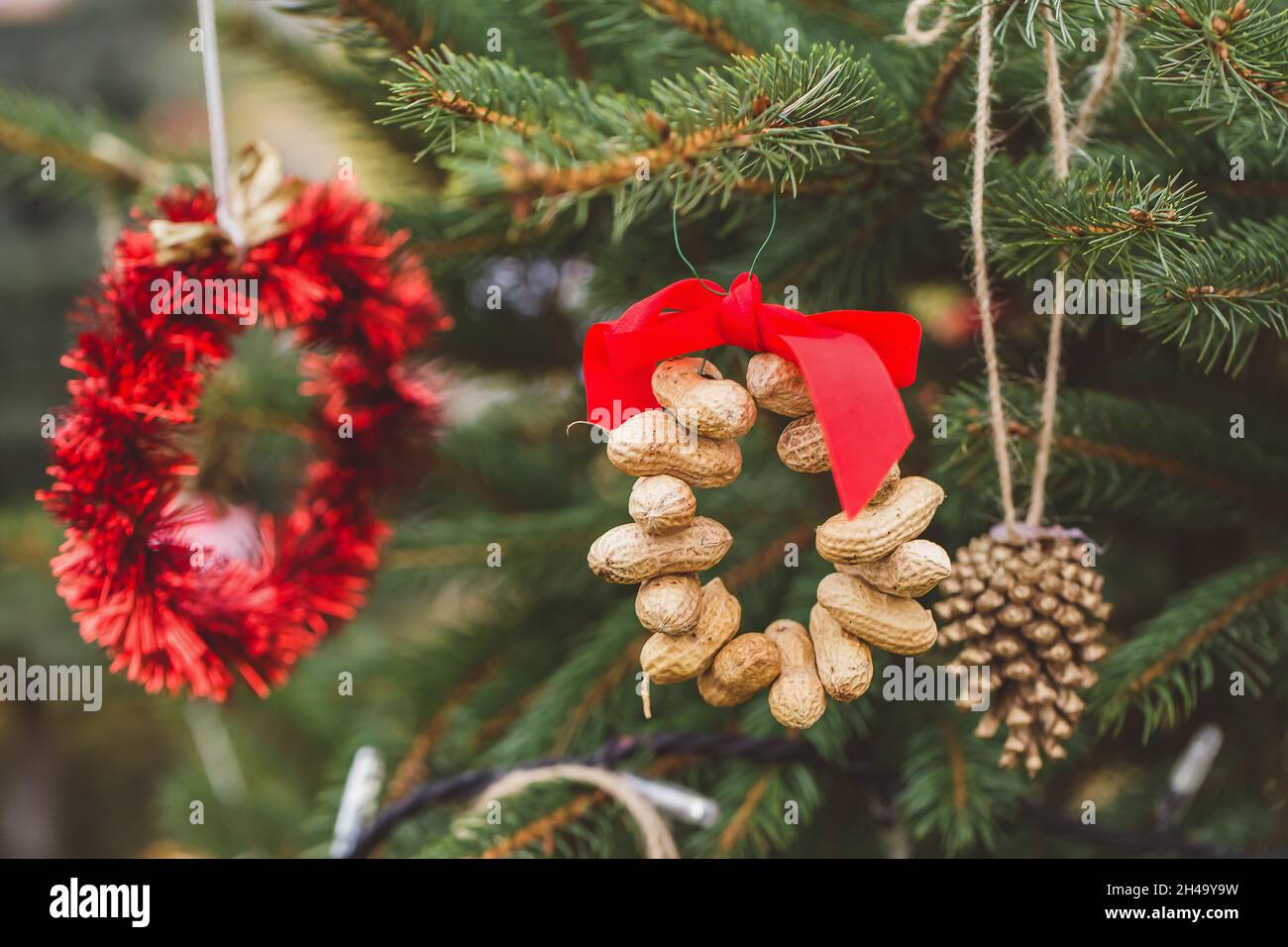 Peanuts handmade decoration on Christmas tree. Diy decoration ideas for ...