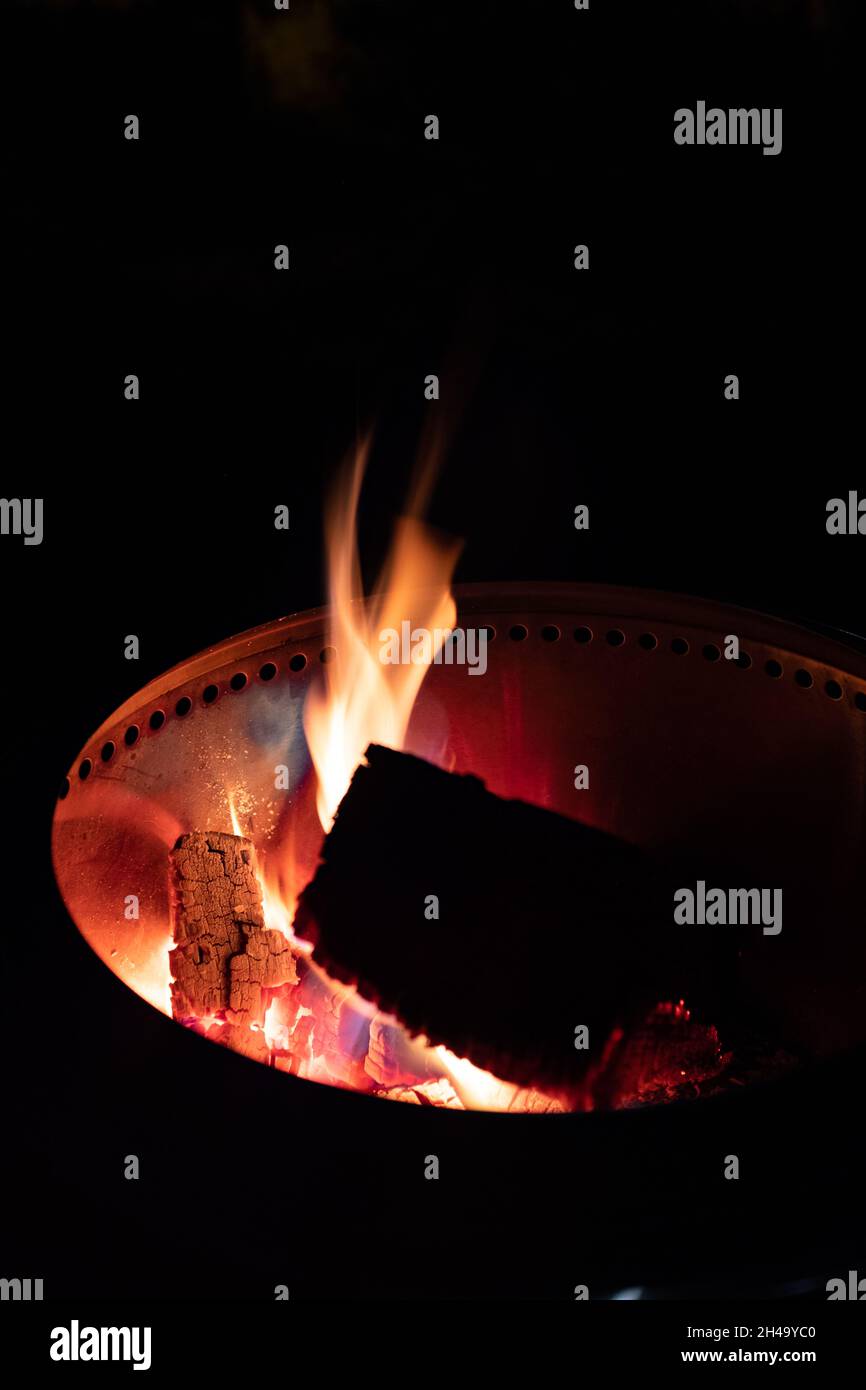 Vertical selective focus of fire flames in the darkness Stock Photo - Alamy