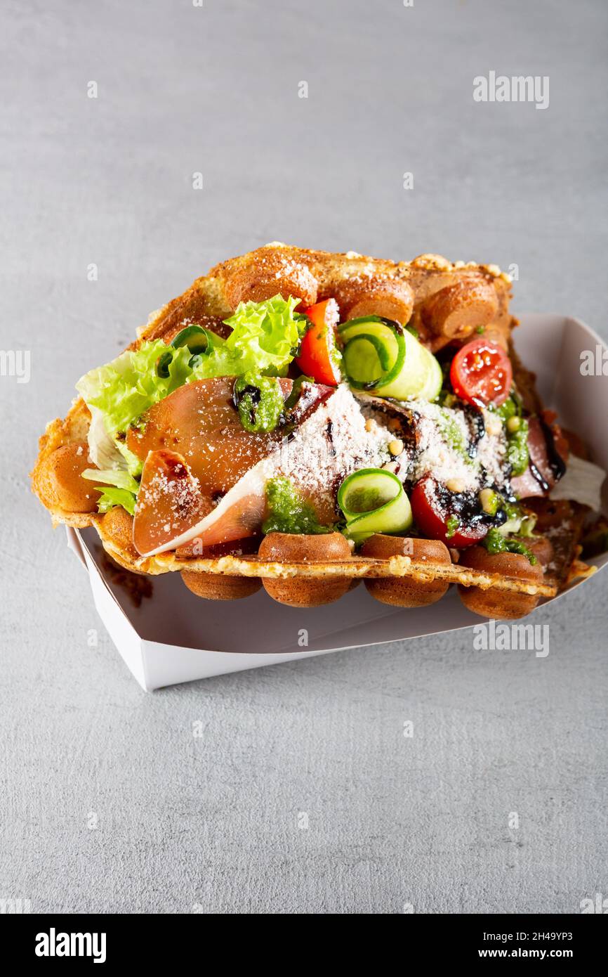 Bubble wafer with salad and meat take away food Stock Photo - Alamy