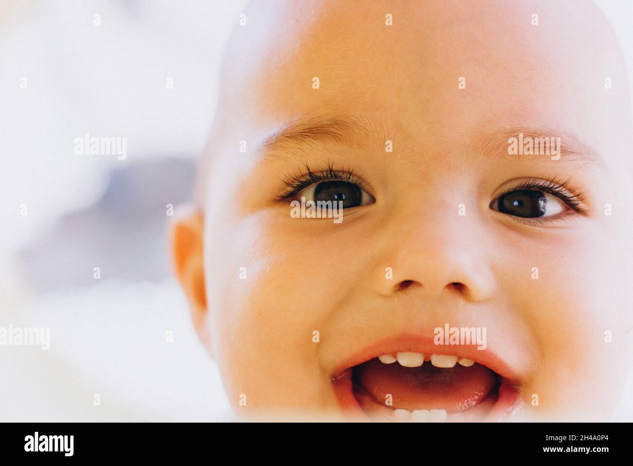Happy smiling baby boy looking to the camera Stock Photo - Alamy