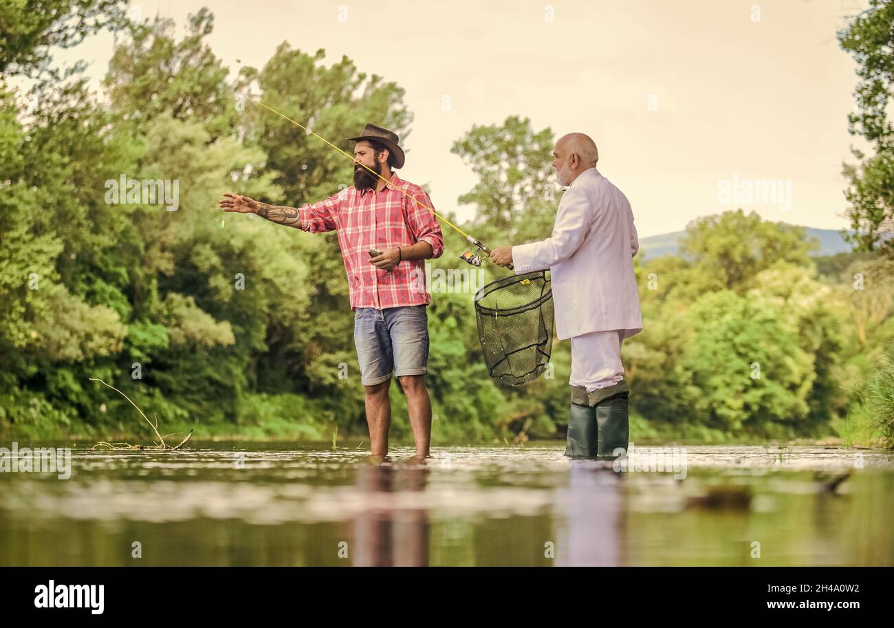 Fish with companion who help in emergency. Bearded man elegant ...