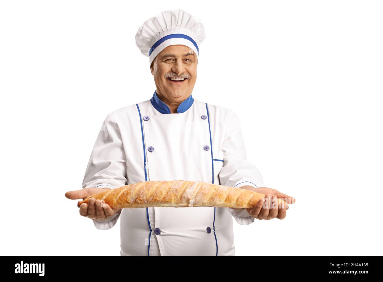 Cheerful male chef holding a baguette bread isolated on white ...