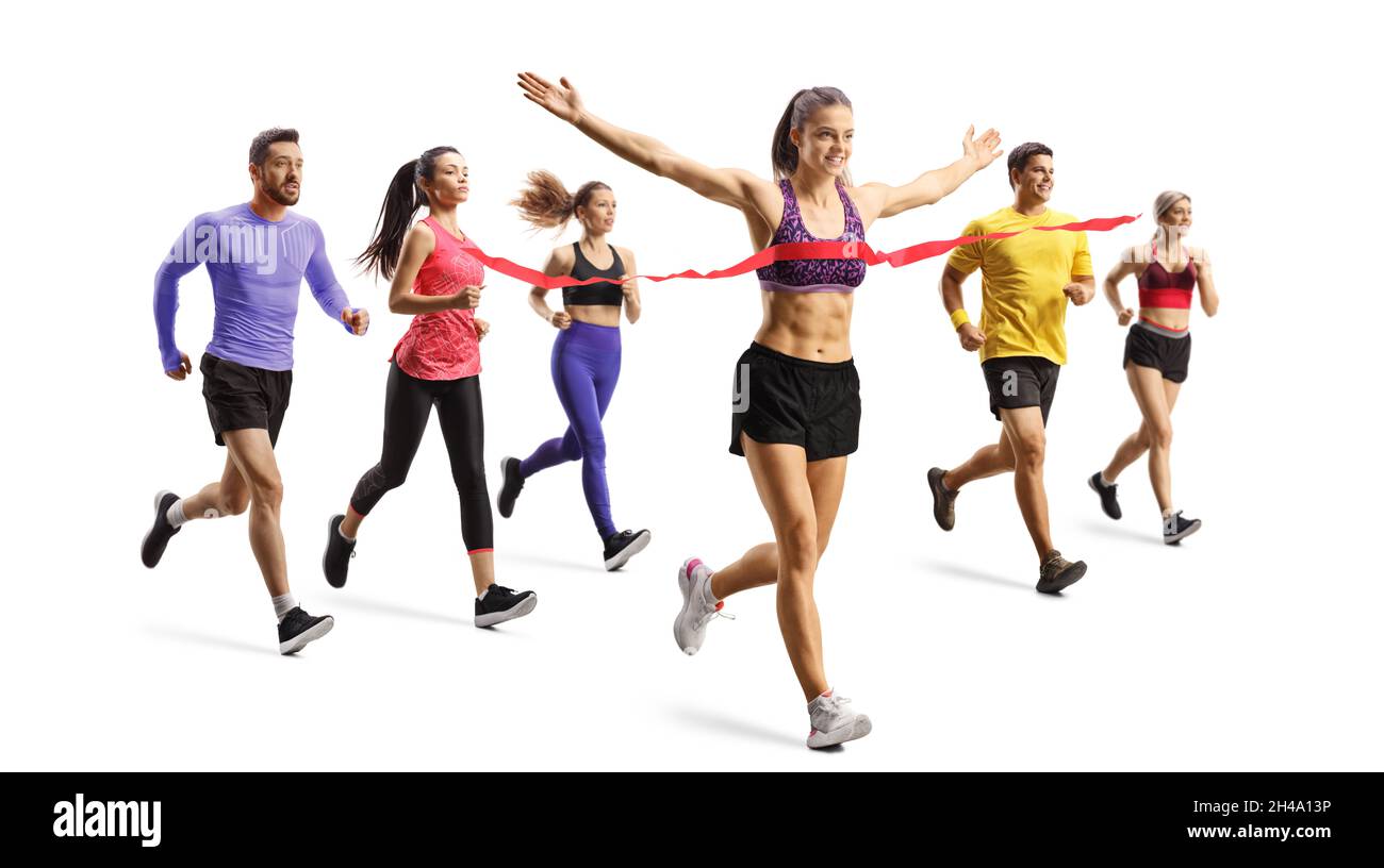 Full length shot of people running a marathon and a woman in front of ...