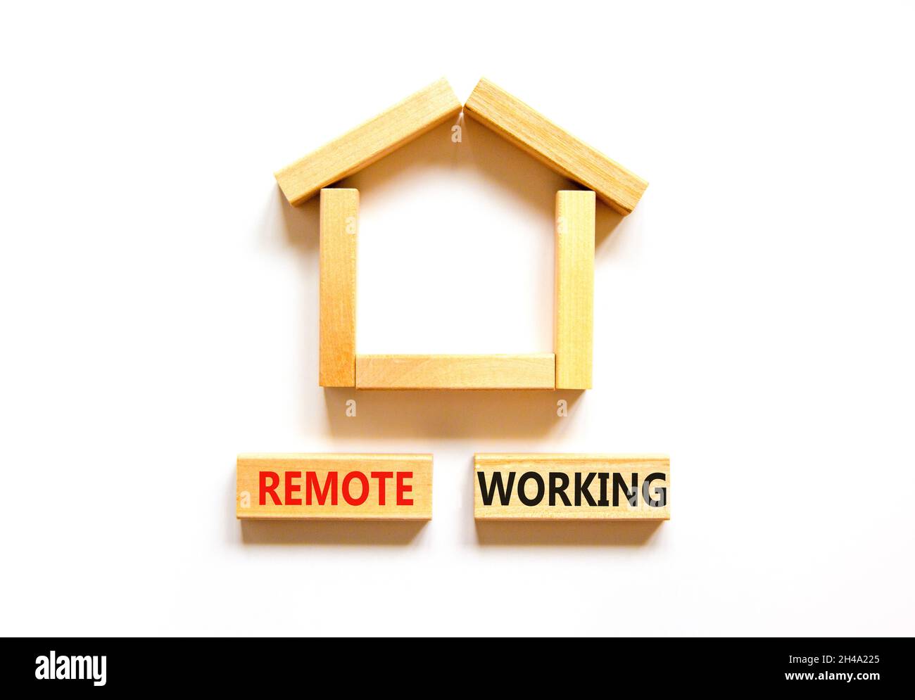 Remote working symbol. Concept words 'Remote working' on wooden blocks ...
