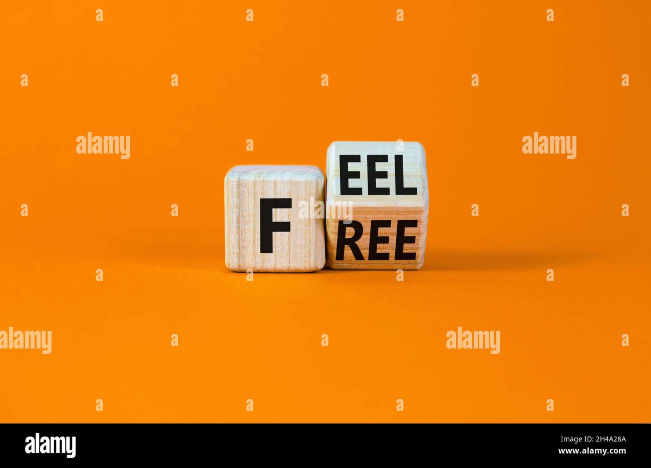 Feel free symbol. Turned a wooden cube with concept words 'Feel free ...