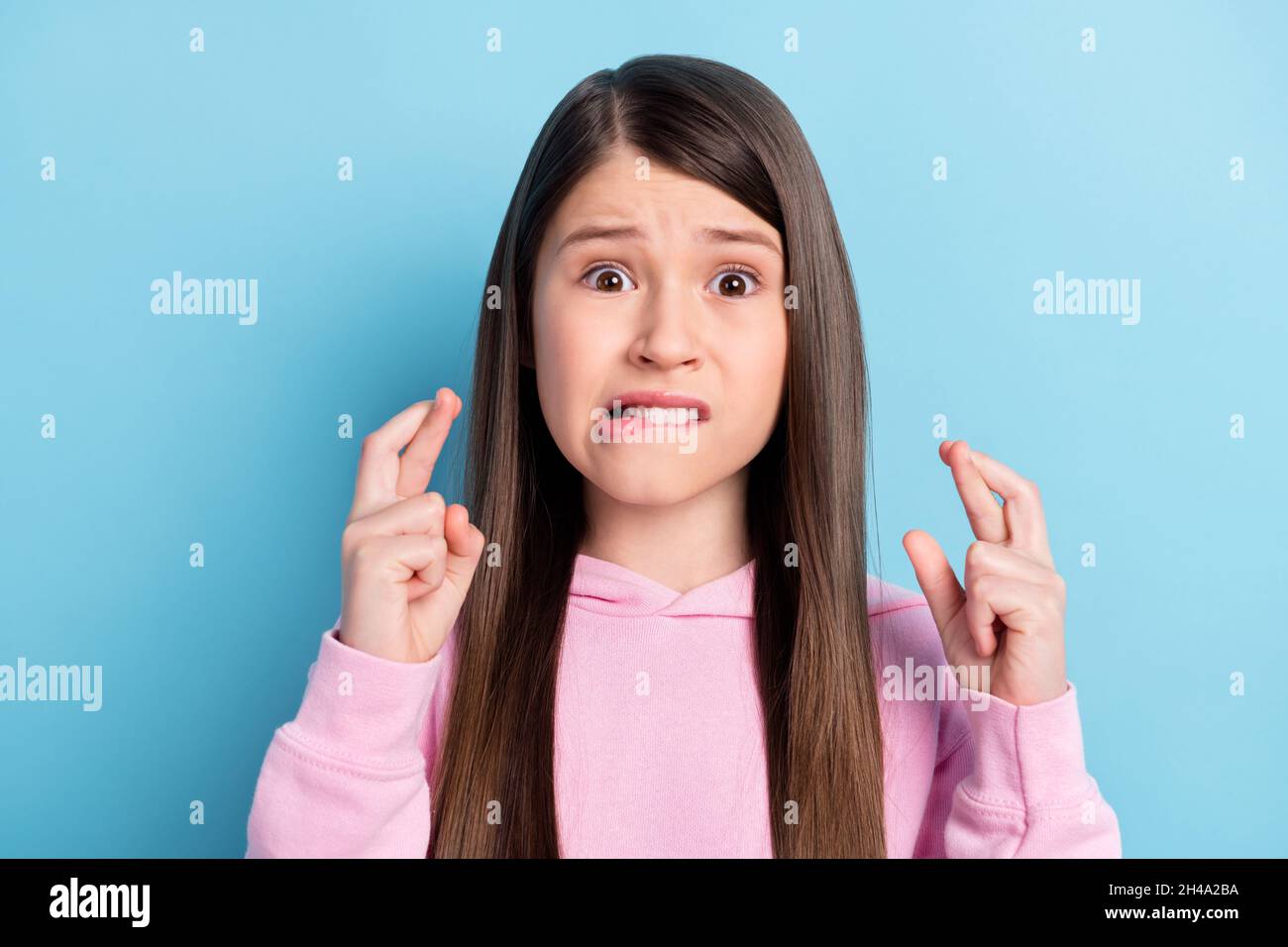 Portrait of attractive discontent worried funky girl biting lip crossed ...