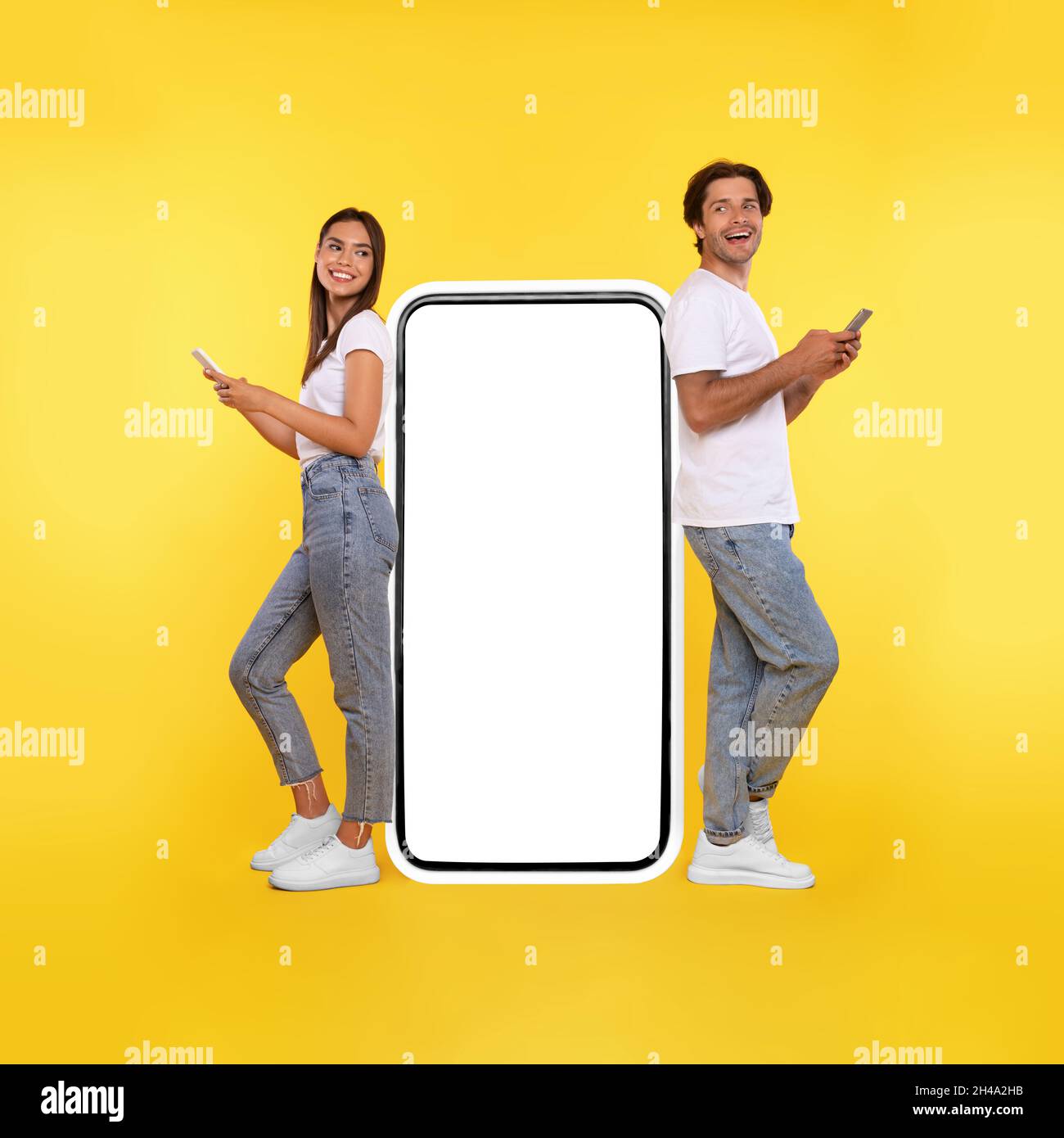 Modern Communication. Full Body Length Of Happy Cheerful Couple Leaning ...