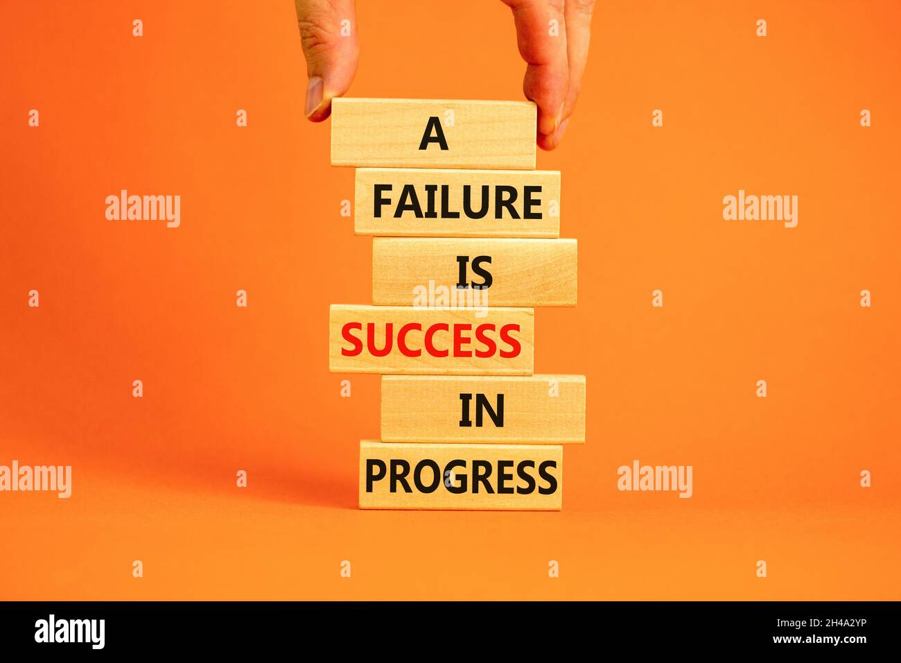 Failure or success symbol. Wooden blocks with words A failure is ...