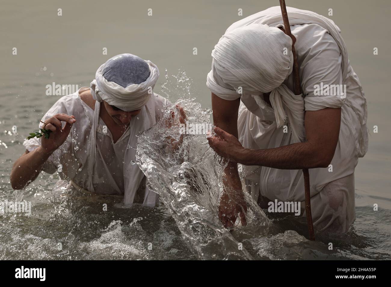 Baghdad, Iraq. 01st Nov, 2021. Members of the Mandaean community take ...