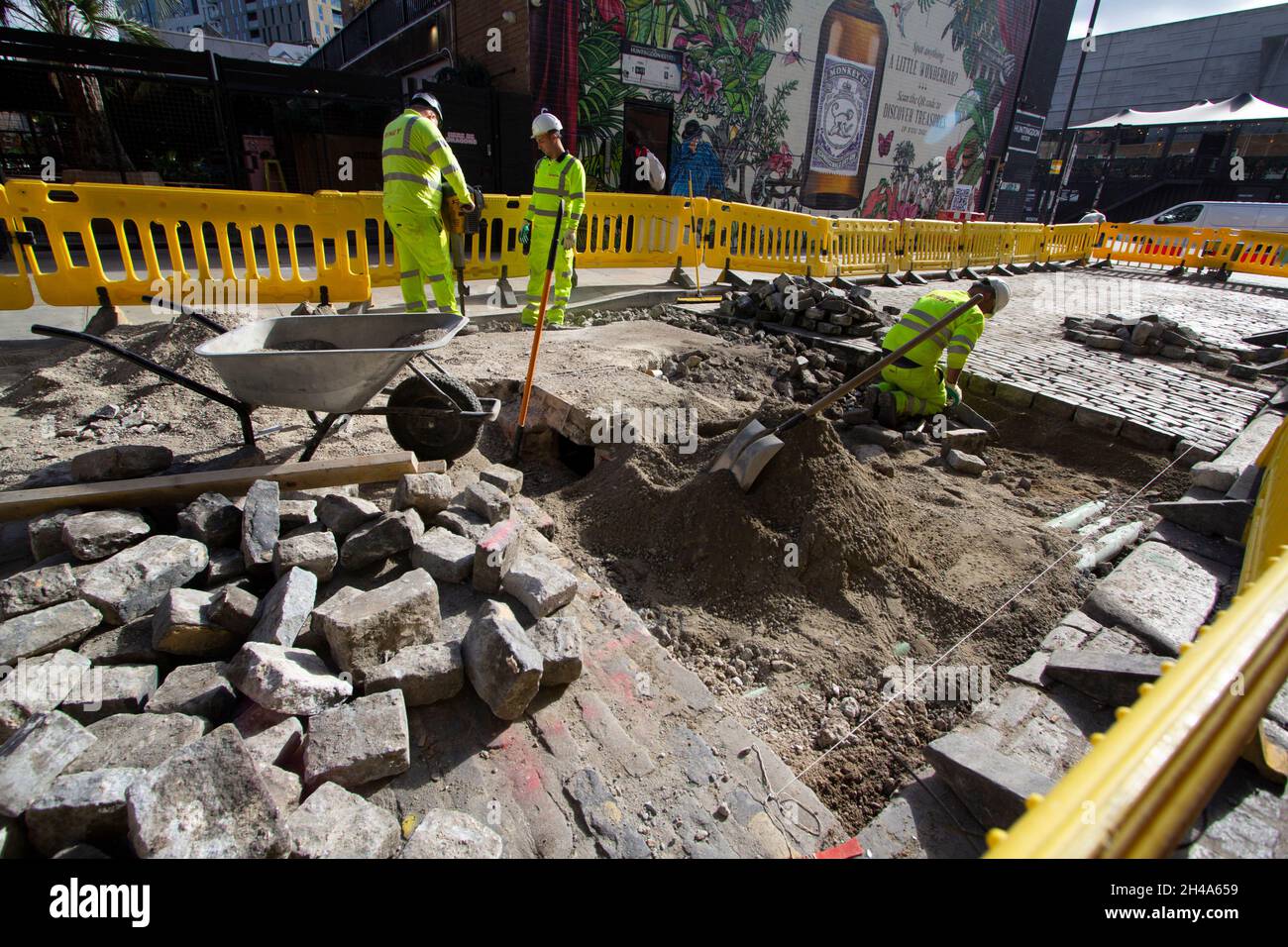Ebor Street, builder contractors replacing road surface on closed ...