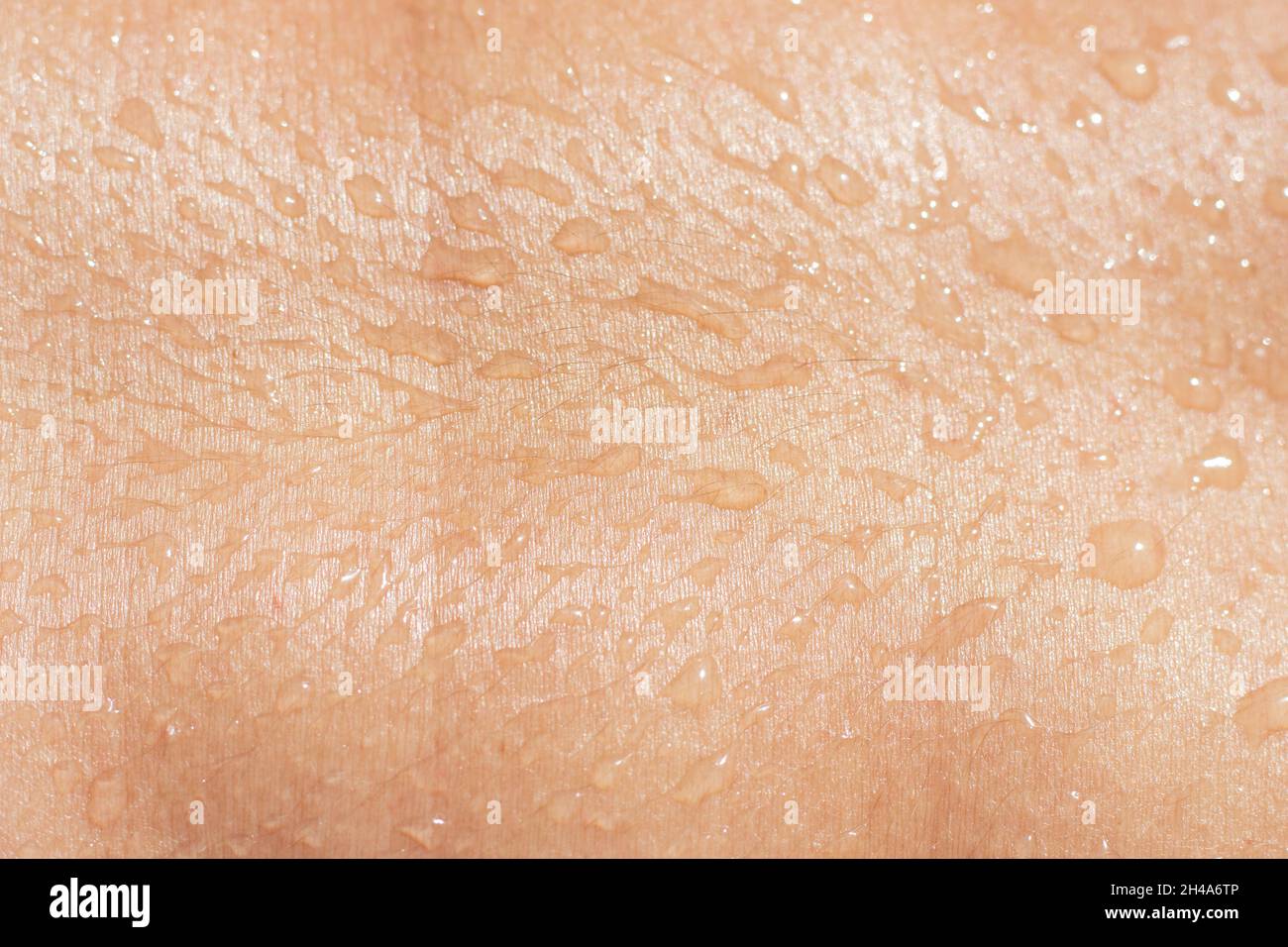 wet female skin texture with liquid drops close-up Stock Photo - Alamy