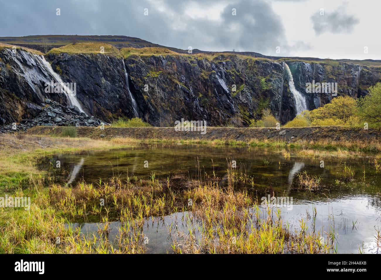 Waterfalls after heavy rainfall at Ingleton quarry located just to the ...
