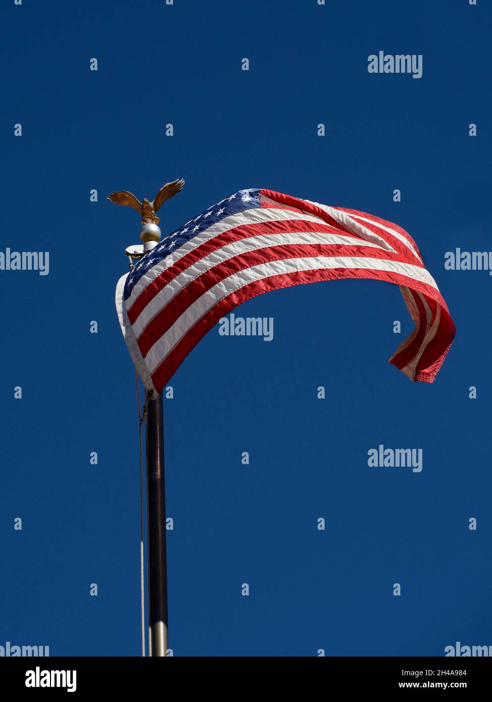 Windy flag hi-res stock photography and images - Alamy