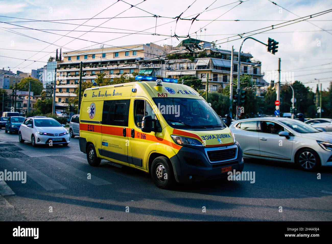 Athens, Greece - November 01, 2021 Greek ambulance driving through the ...