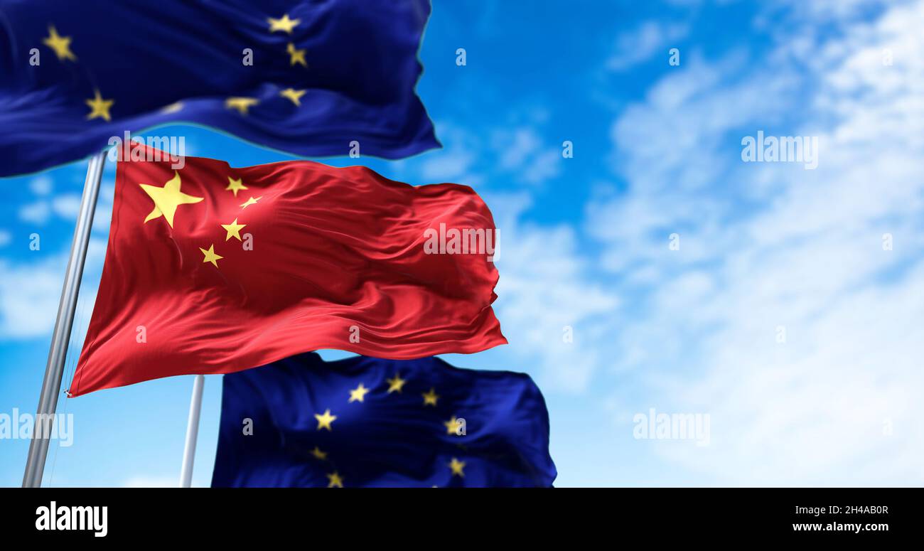 The flags of China and the European Union waving. International ...