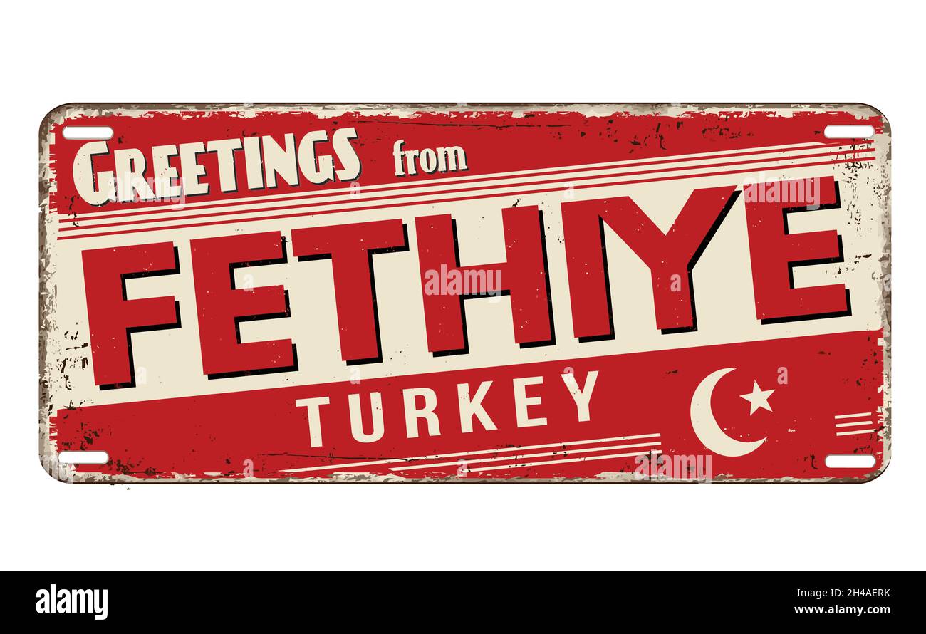 Greetings from Fethiye vintage rusty metal plate on a white background ...
