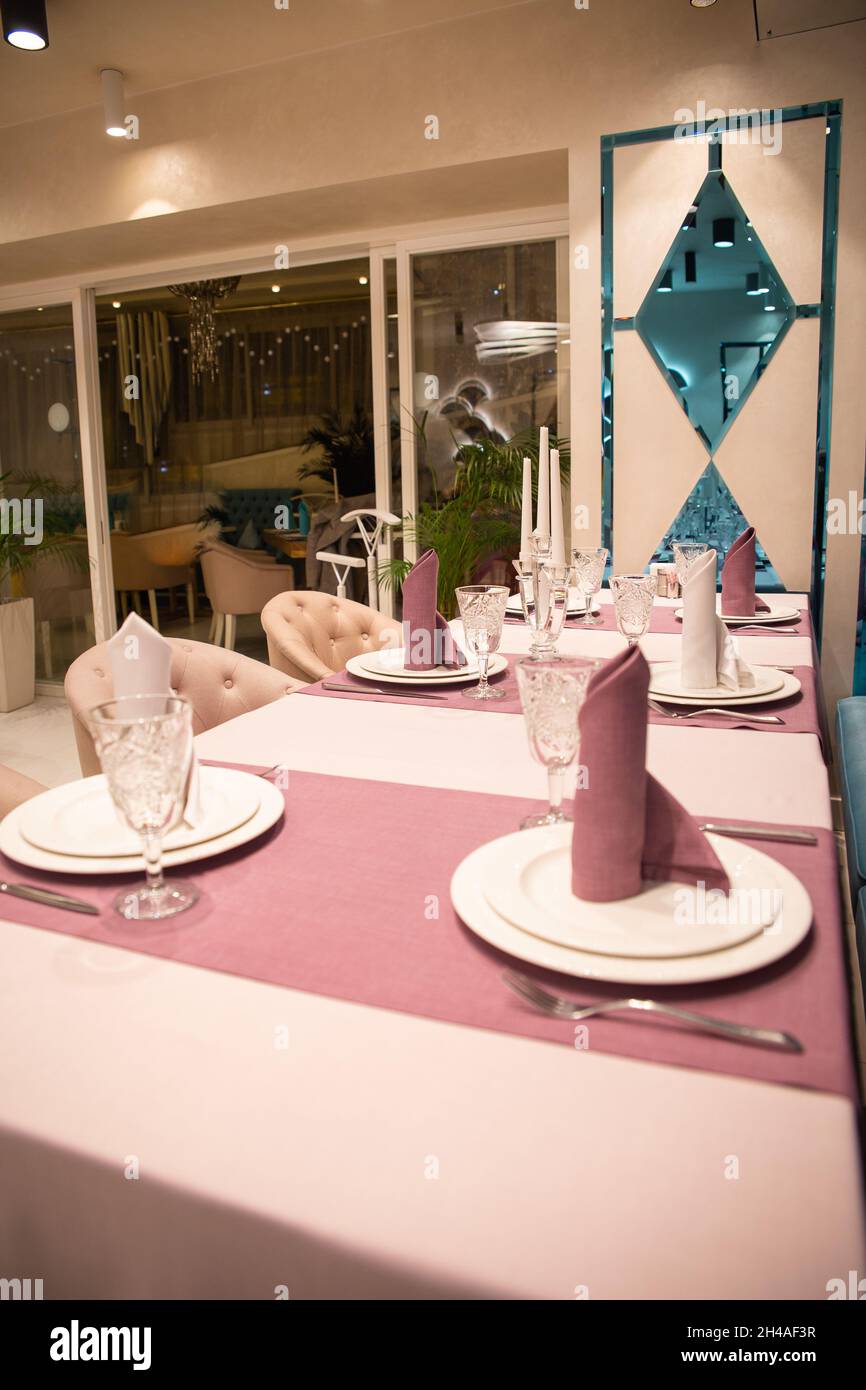 the interior of the restaurant in pink and turquoise colors Stock Photo ...