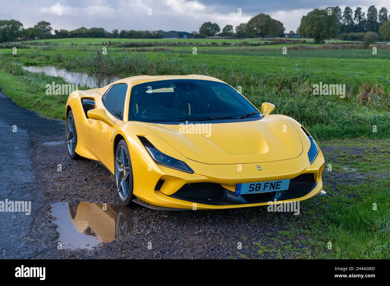 Yellow Ferrari F8 Spider sportswear photographed on the Gwent Levels ...