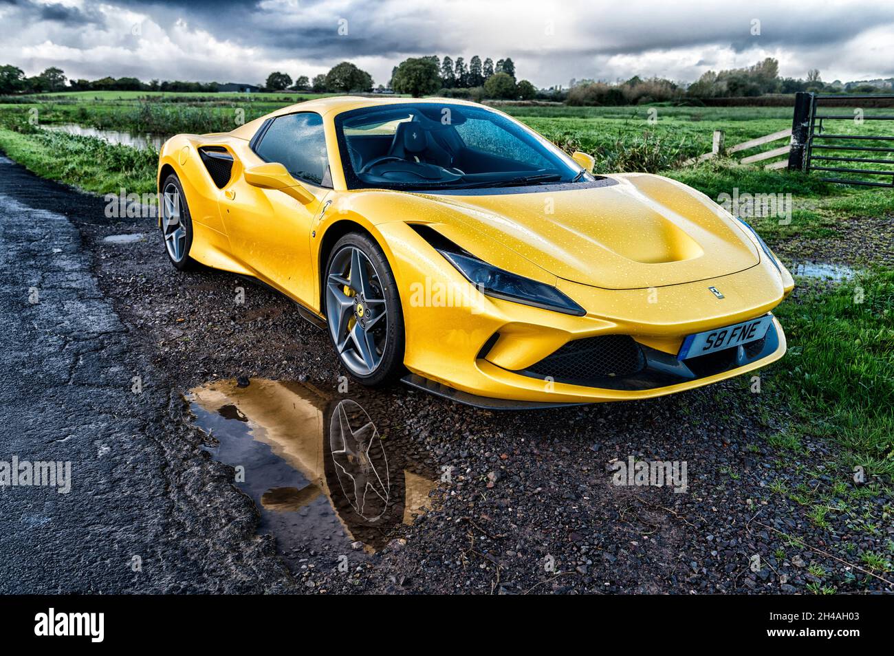 Yellow Ferrari F8 Spider sportswear photographed on the Gwent Levels ...