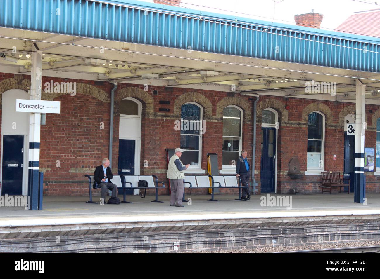 Railway Station, Waiting for a Train, Platform Stock Photo - Alamy