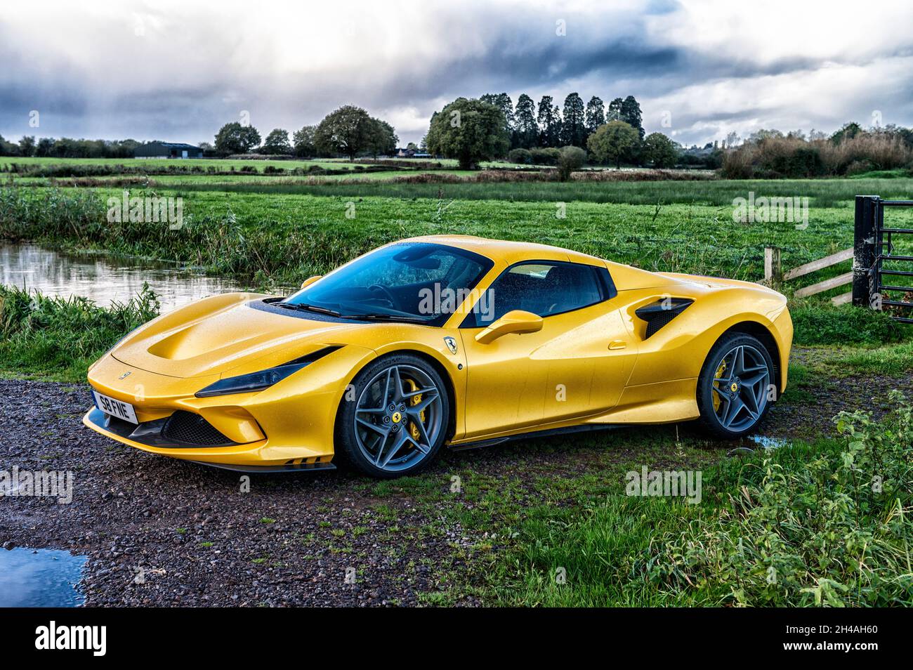 Yellow Ferrari F8 Spider sportswear photographed on the Gwent Levels ...