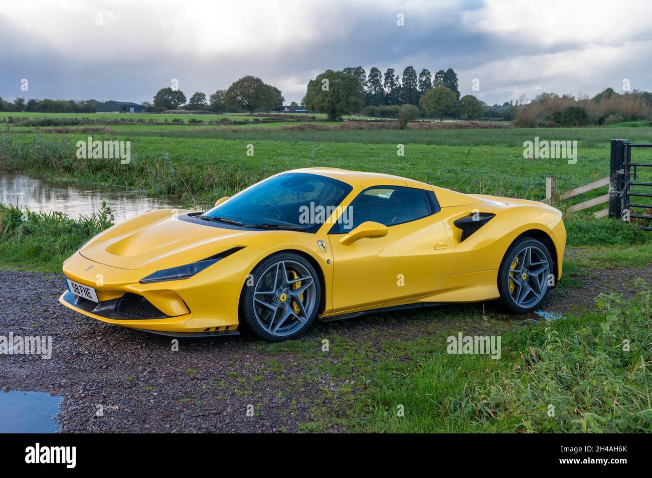 Yellow Ferrari F8 Spider sportswear photographed on the Gwent Levels ...