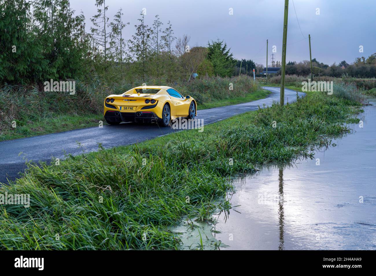 Yellow Ferrari F8 Spider sportswear photographed on the Gwent Levels ...
