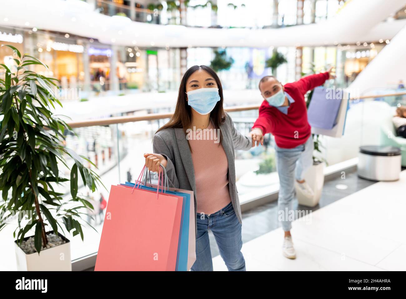 Man dragging woman hi-res stock photography and images - Alamy