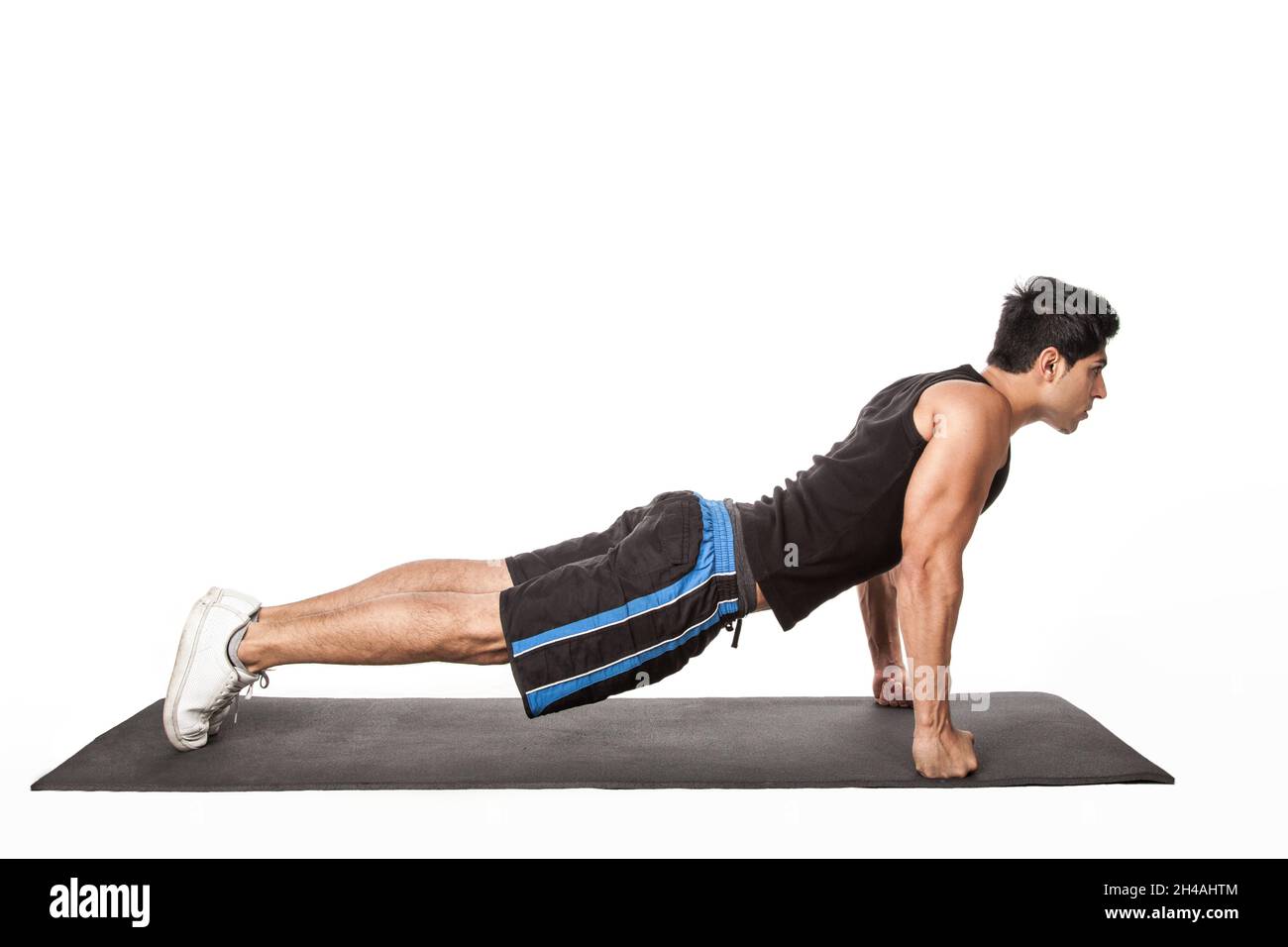 In gym young handsome guy Cut Out Stock Images & Pictures - Alamy