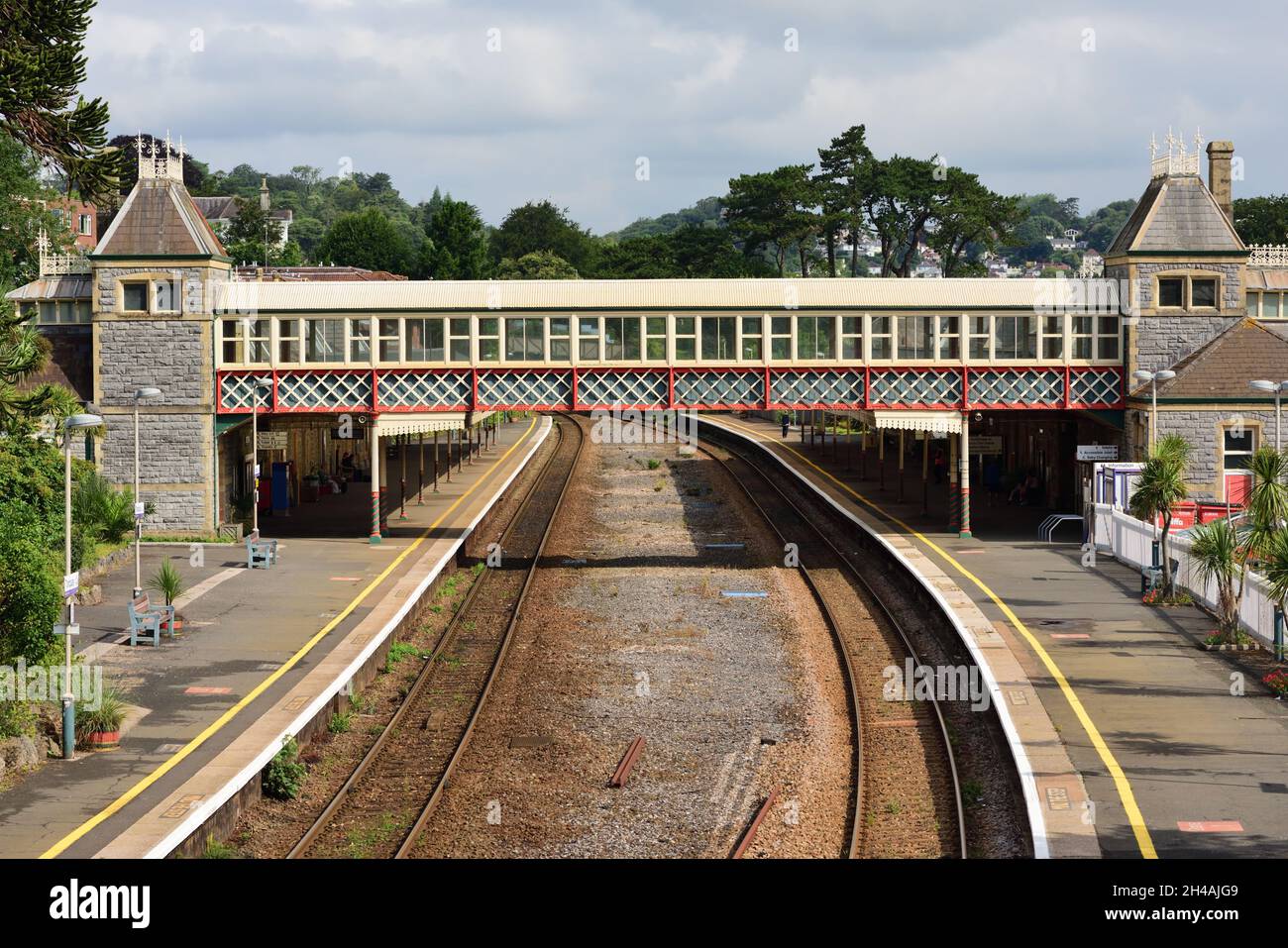 Torquay railway station with attractive footbridge Stock Photo - Alamy