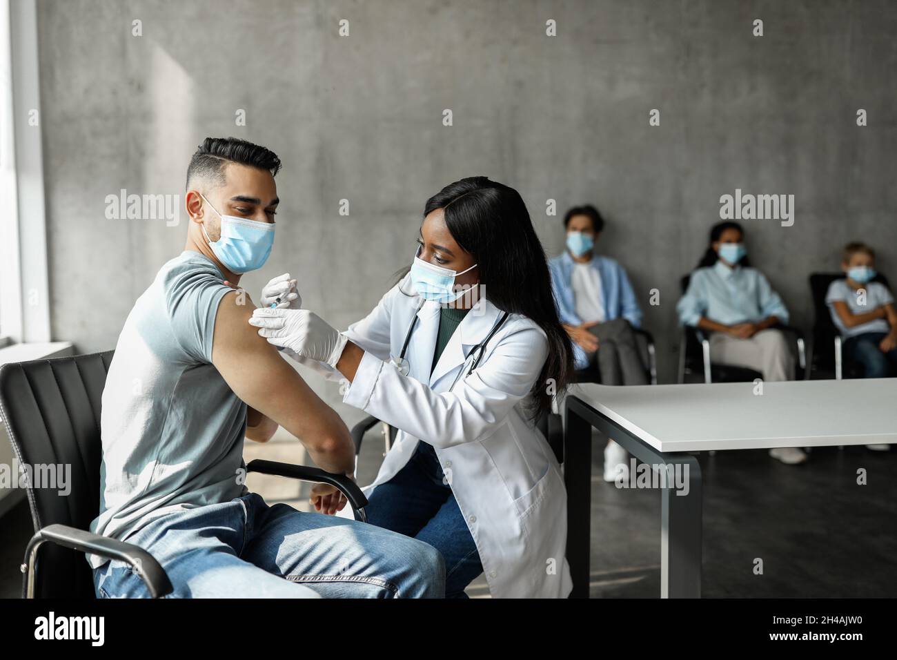 Children injection queue hi-res stock photography and images - Alamy
