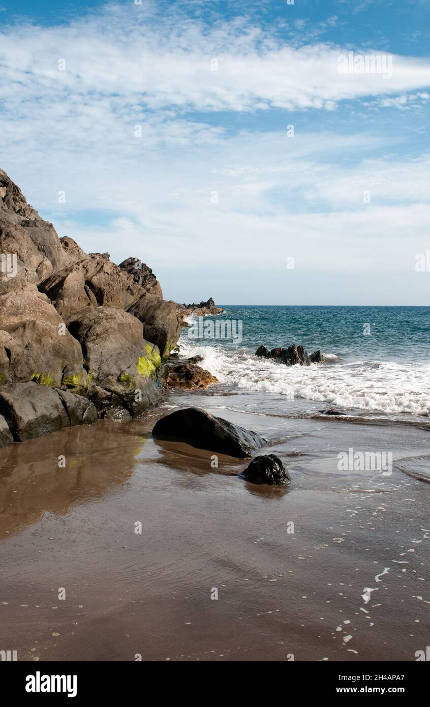 Lonely beach at sunset hi-res stock photography and images - Alamy