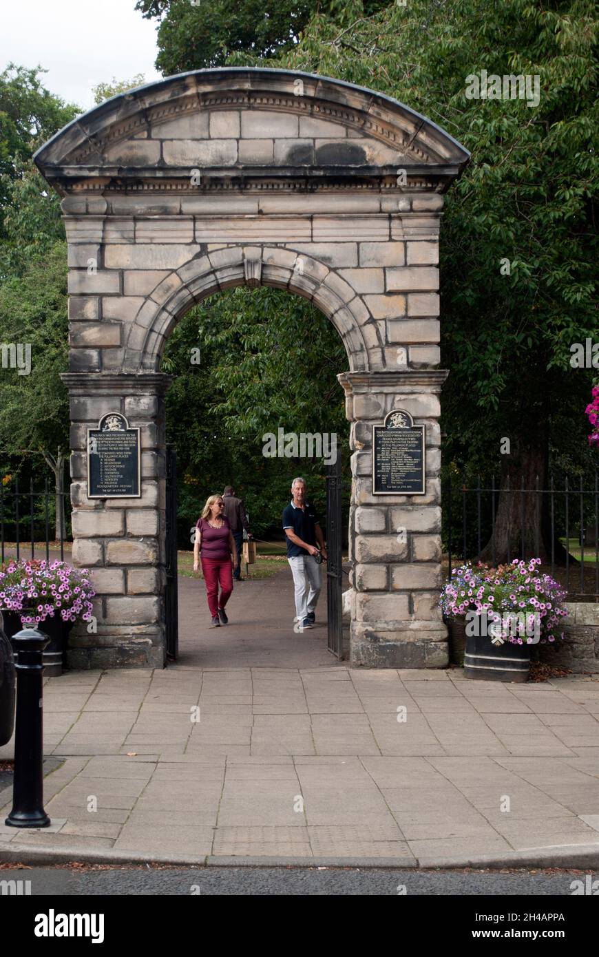 Stone commemorative arch entrance to Hexham Park dedicated to 4th ...
