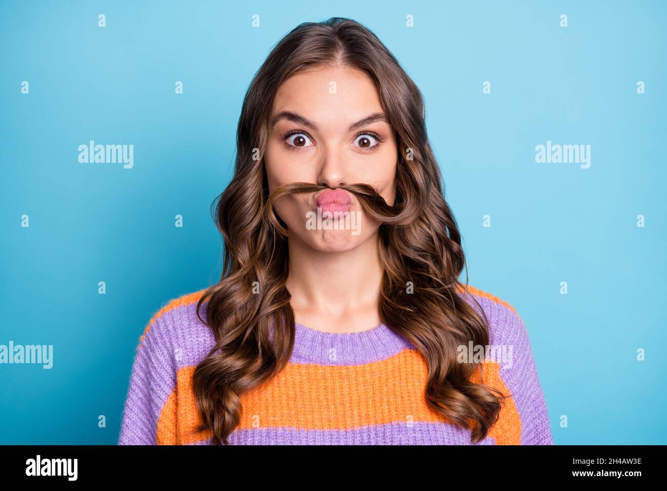 Photo of funky happy young pretty woman make funny face hair mustache ...