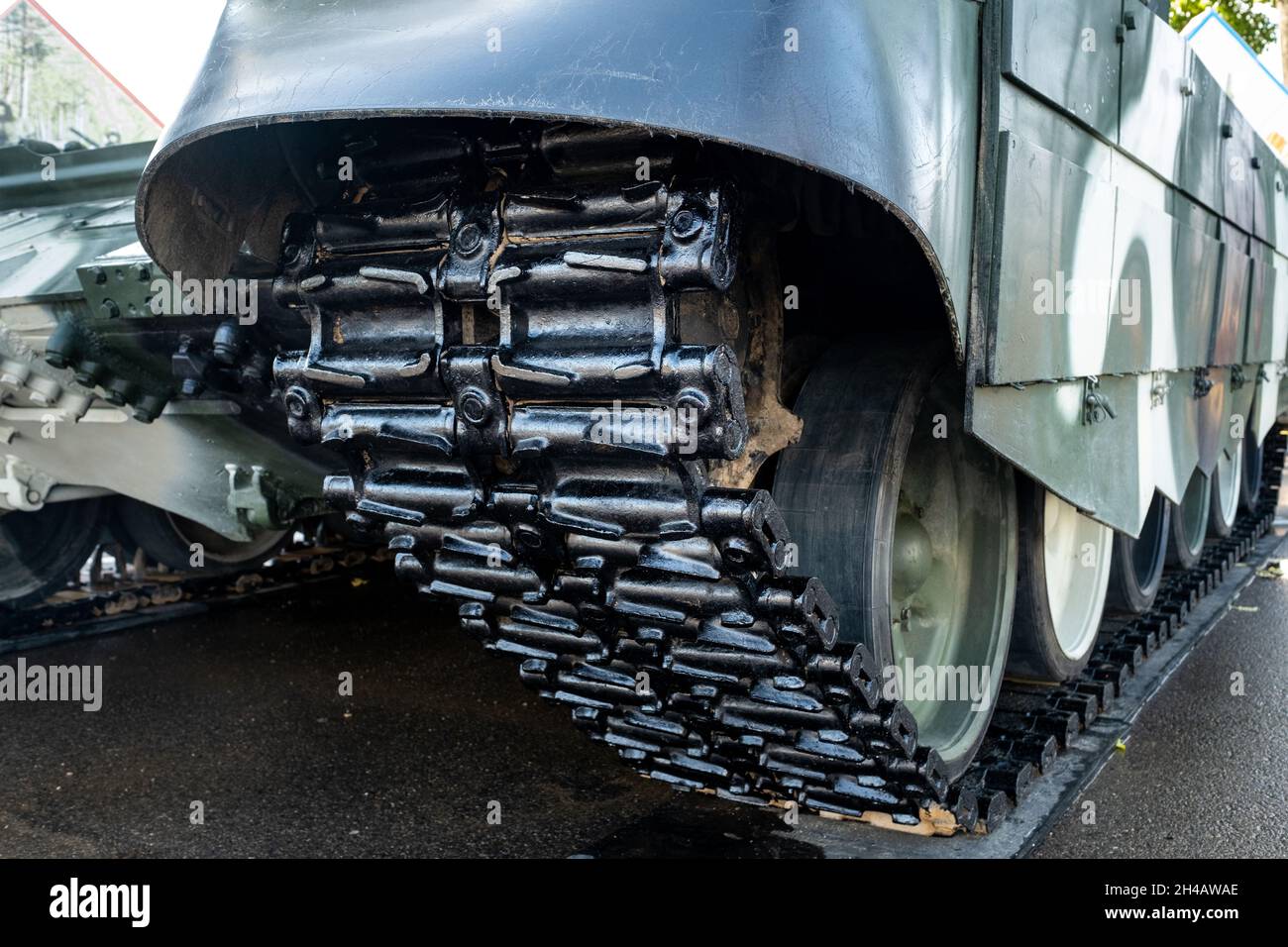 Tracked armor close-up. Black tracks and large rubberized rollers. Tank ...