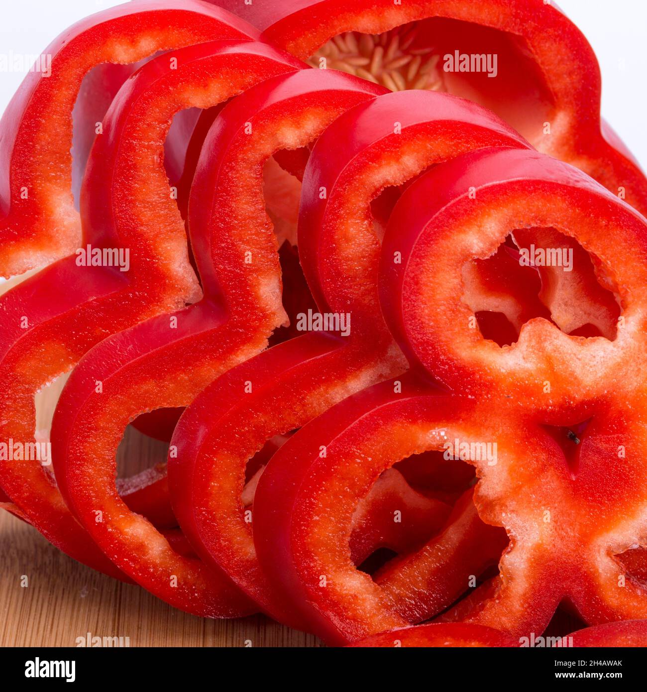 Sliced red pepper isolated on white background Stock Photo - Alamy