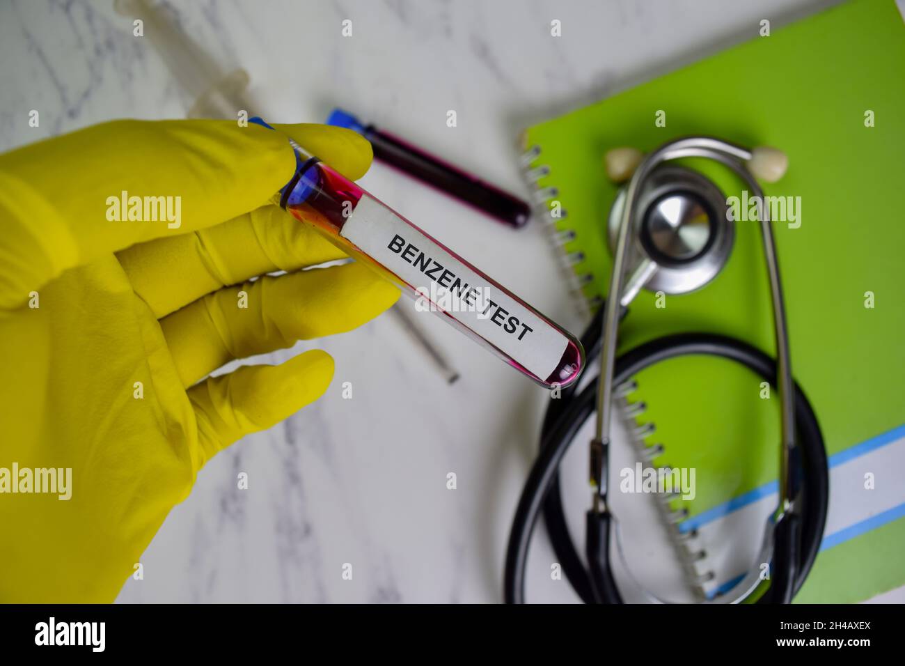 Benzene - Test with blood sample. Top view isolated on office desk ...