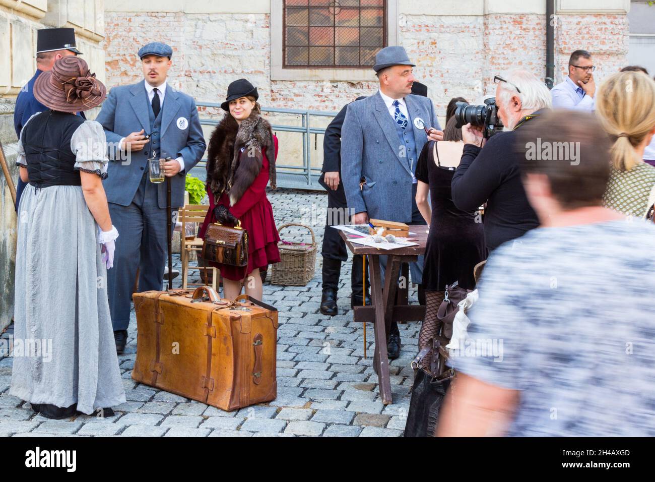 People dressed up in vintage suits, Kult100 event during the centenary ...