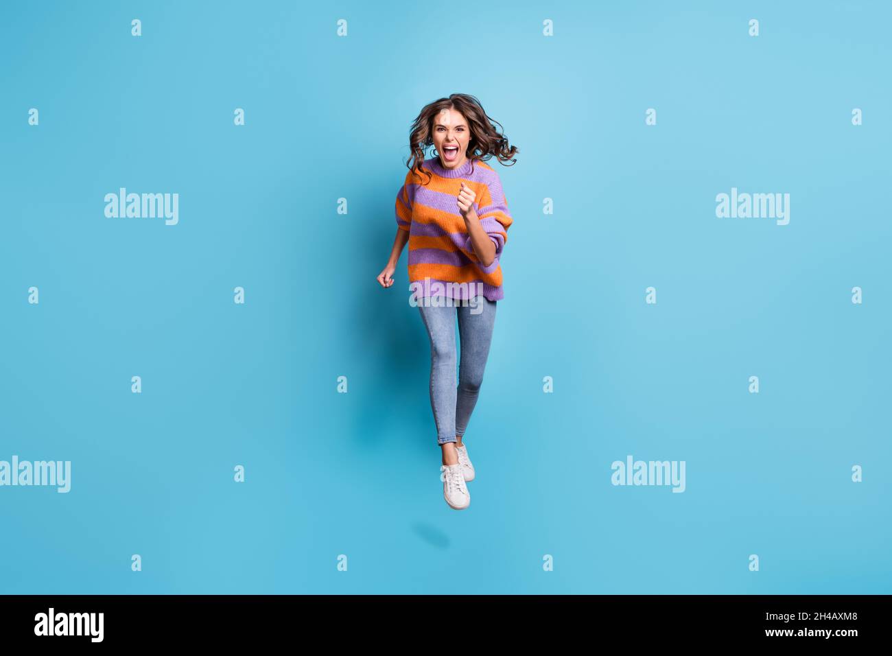 Full length portrait of astonished running fast girl open mouth shout ...