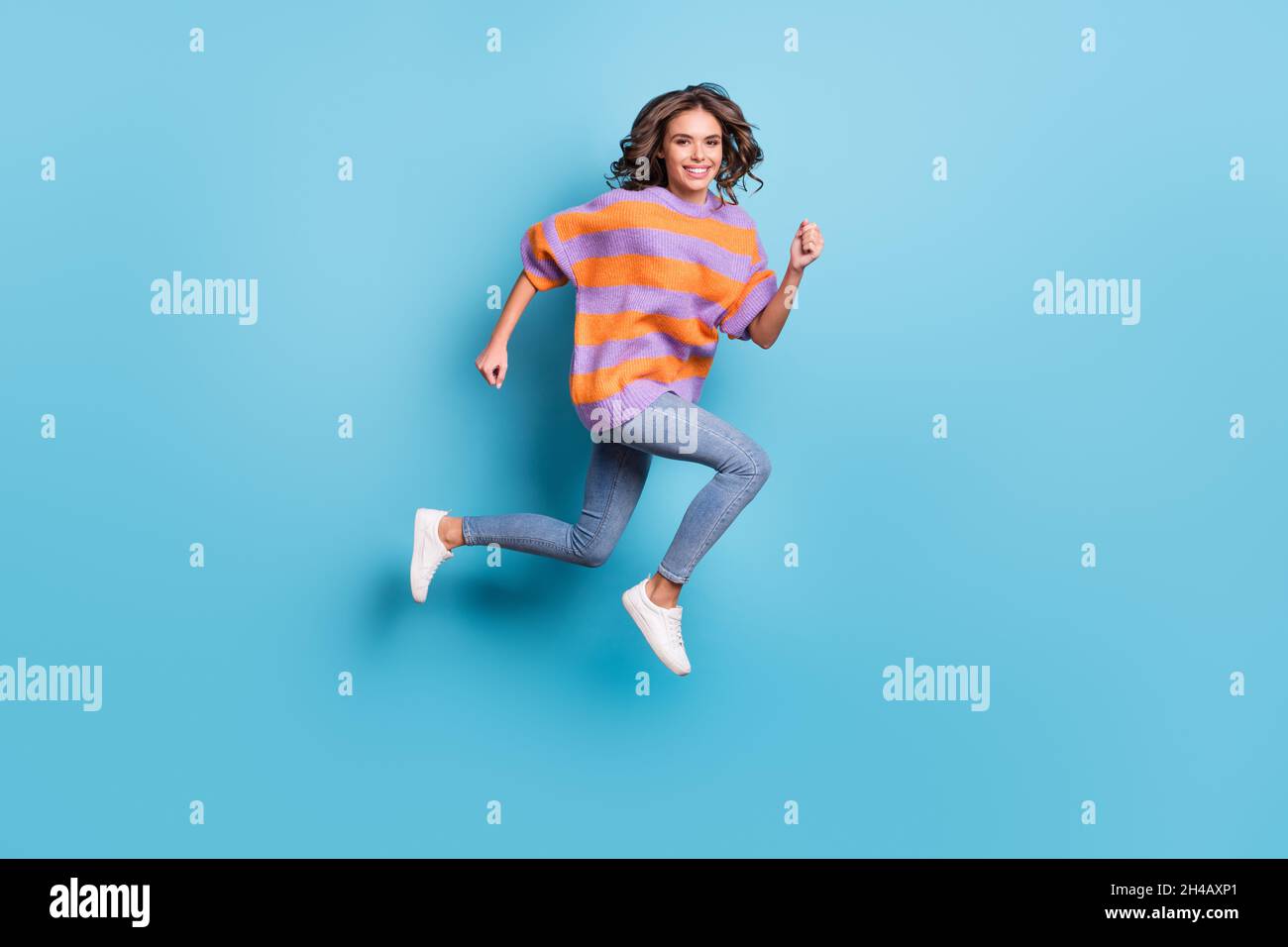 Full length body size view of charming active cheerful girl jumping ...