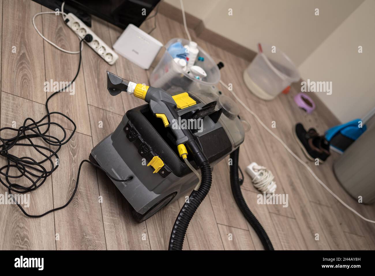 Cleaning a dirty sofa with a sofa washer Stock Photo - Alamy